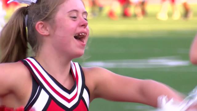 Cheerleader With Down Syndrome Is a Beacon of School Spirit for Her ...