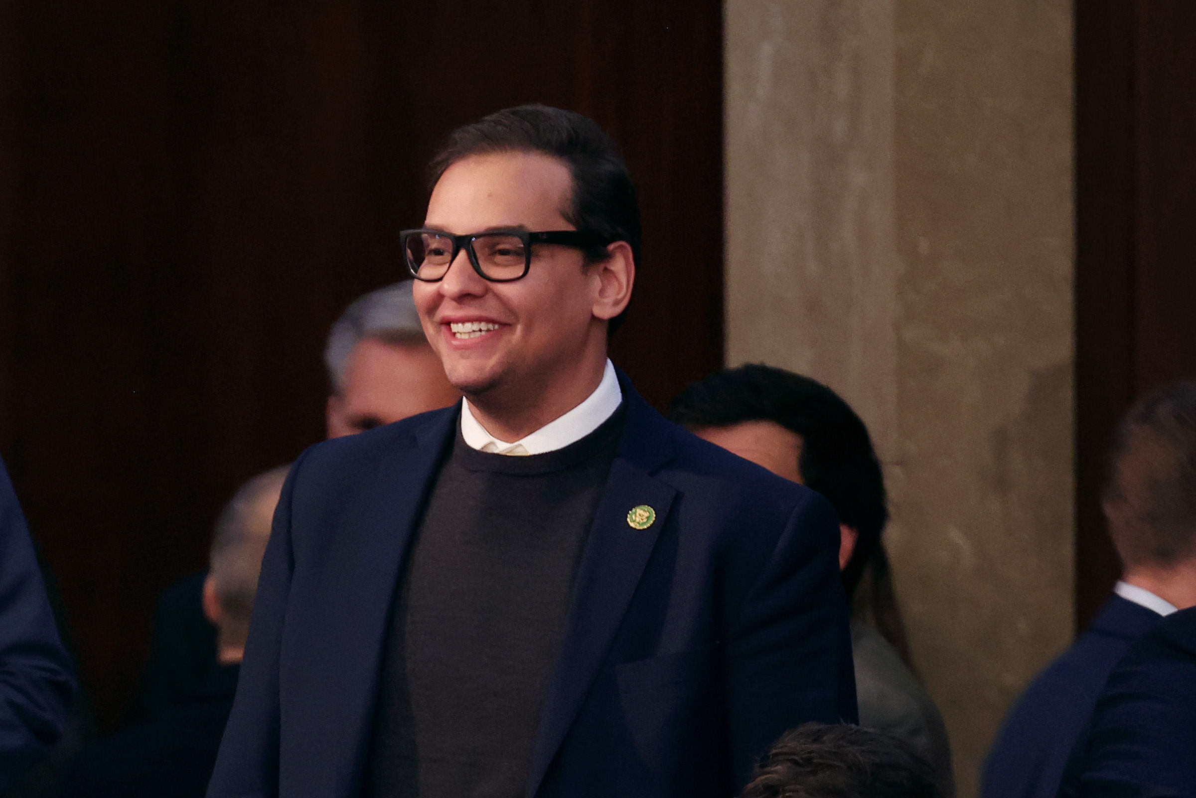 Fact Check: Did George Santos Cross Fingers When Being Sworn Into ...