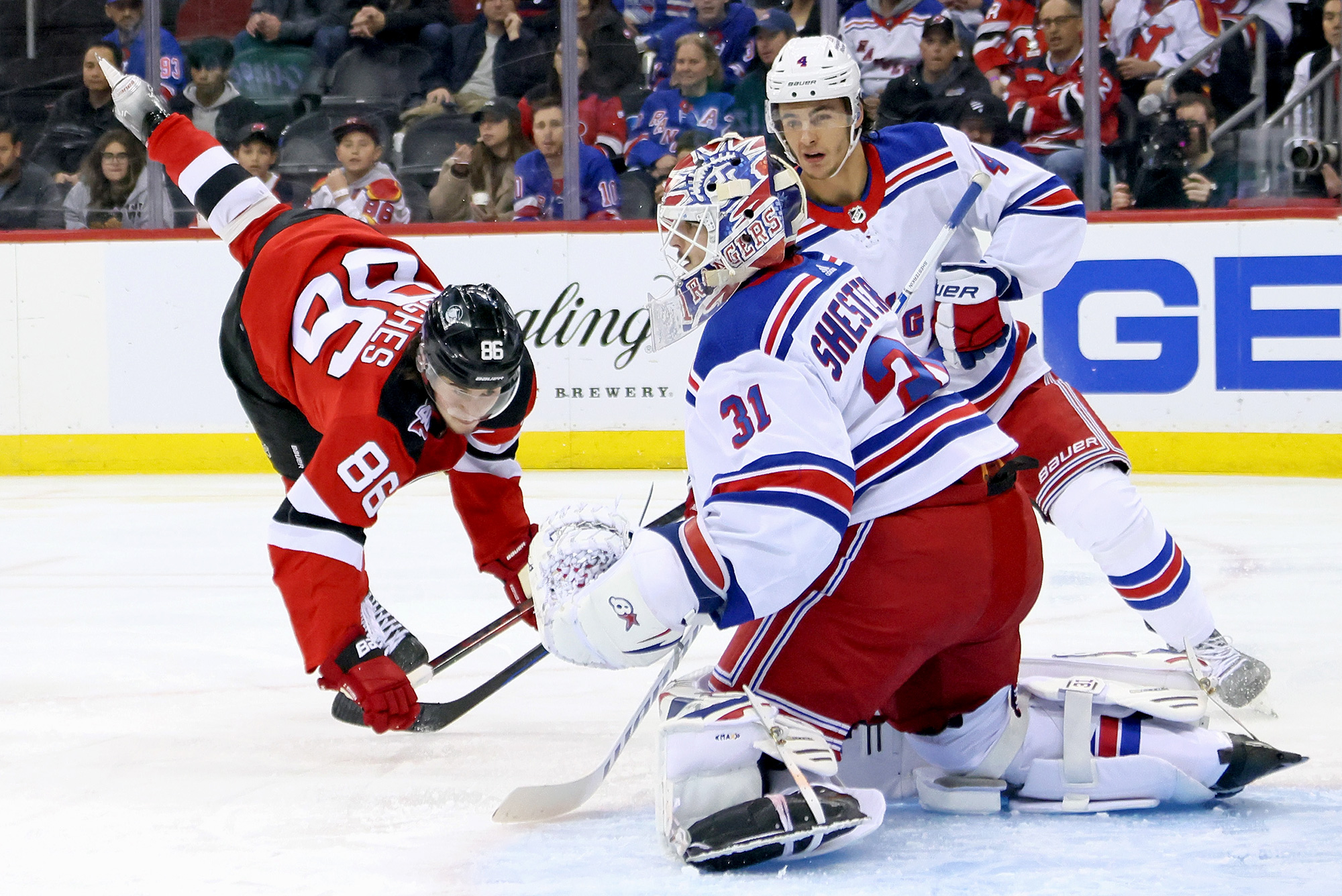 Video of Man Climbing Street Lamp After Devils' Win Goes Viral - Newsweek