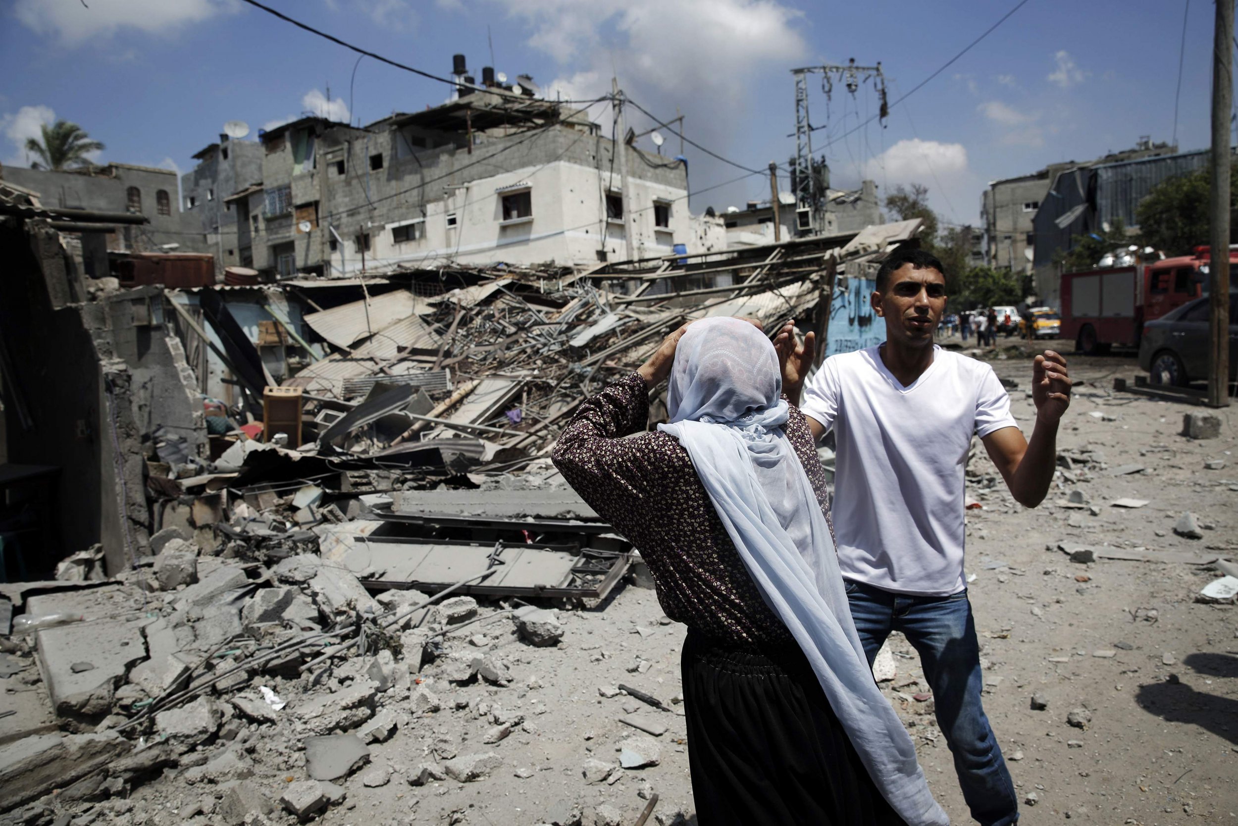 Heavy Shelling Brings Death to Gaza District, Triggers Exodus - Newsweek