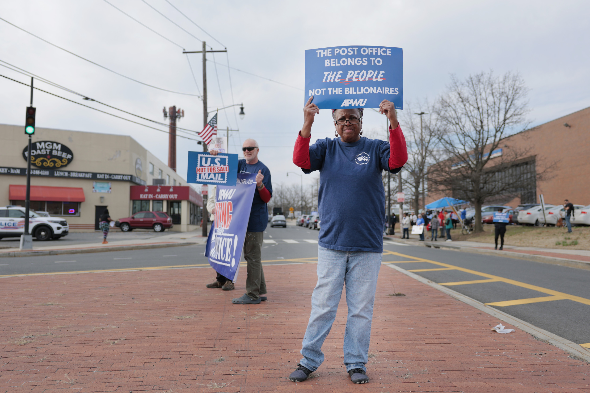 USPS Workers Divided Over New Deal on Pay, Layoffs - Newsweek